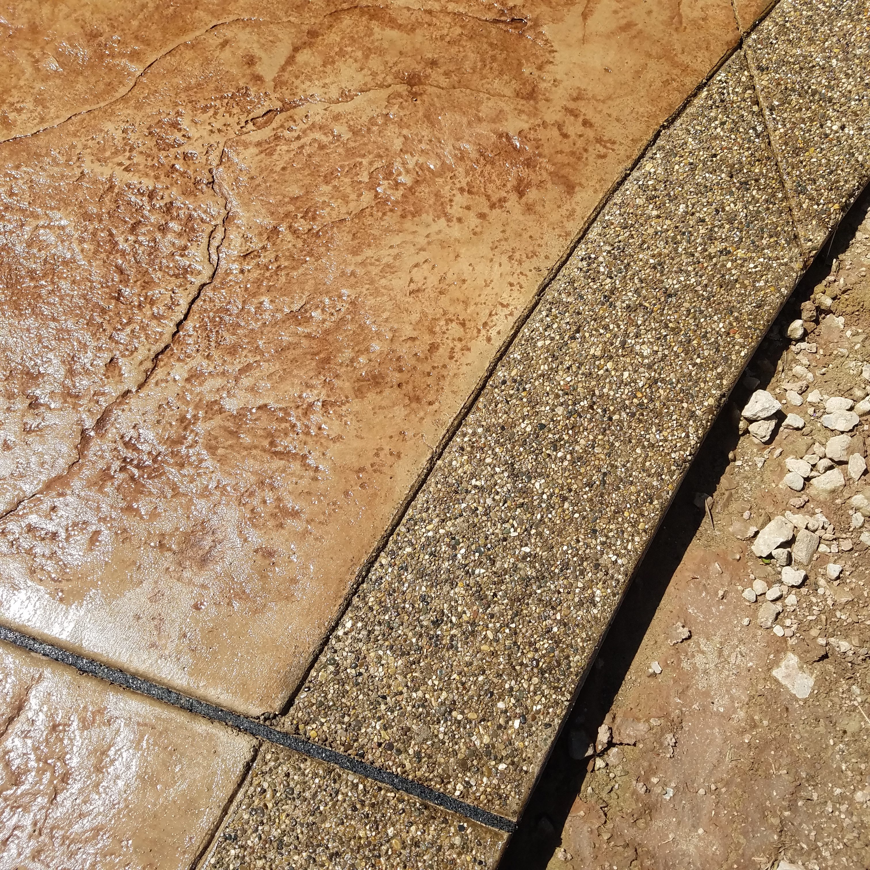 stamped concrete/ exposed agg border - Rolland Cement